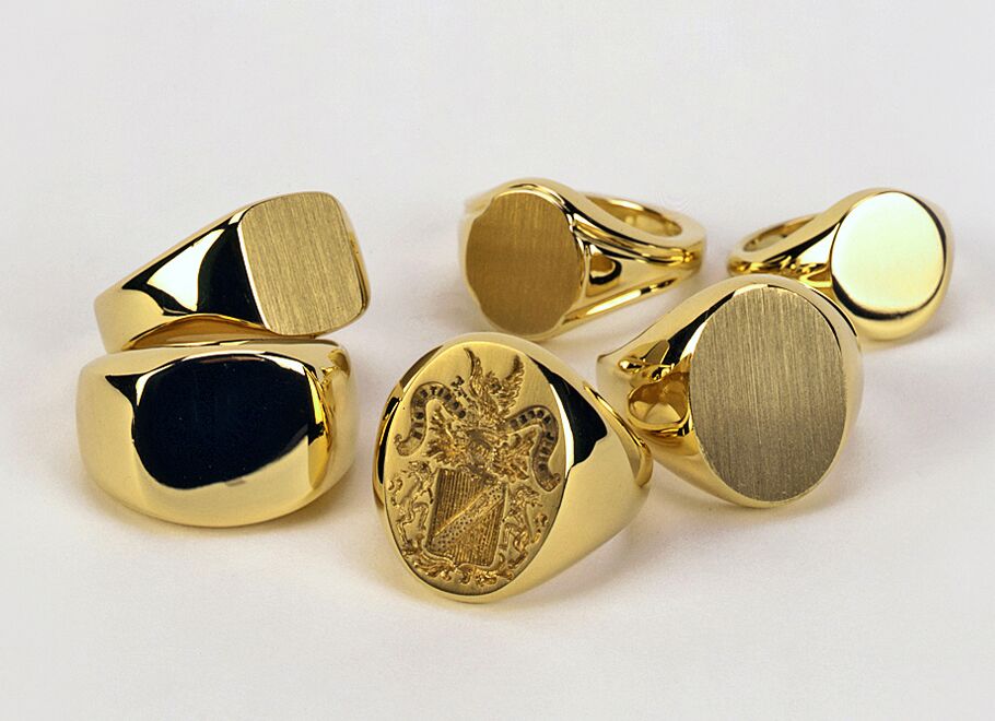 Yellow Gold Oval Shape Signet Rings With Decorated Shoulders